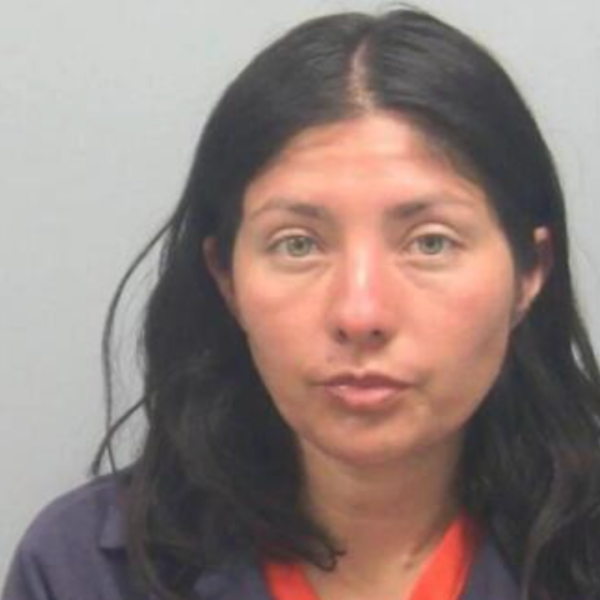 Woman Dances Around Gas Pumps, Tries to Set Nozzle on Fire With Lighter