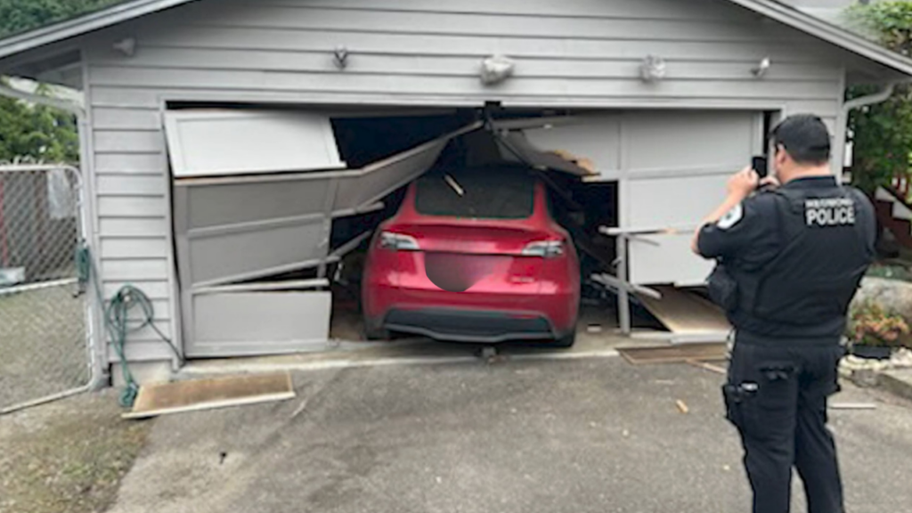 A Tesla Crashed Through a Redmond Garage, and the Driver Blamed an ...
