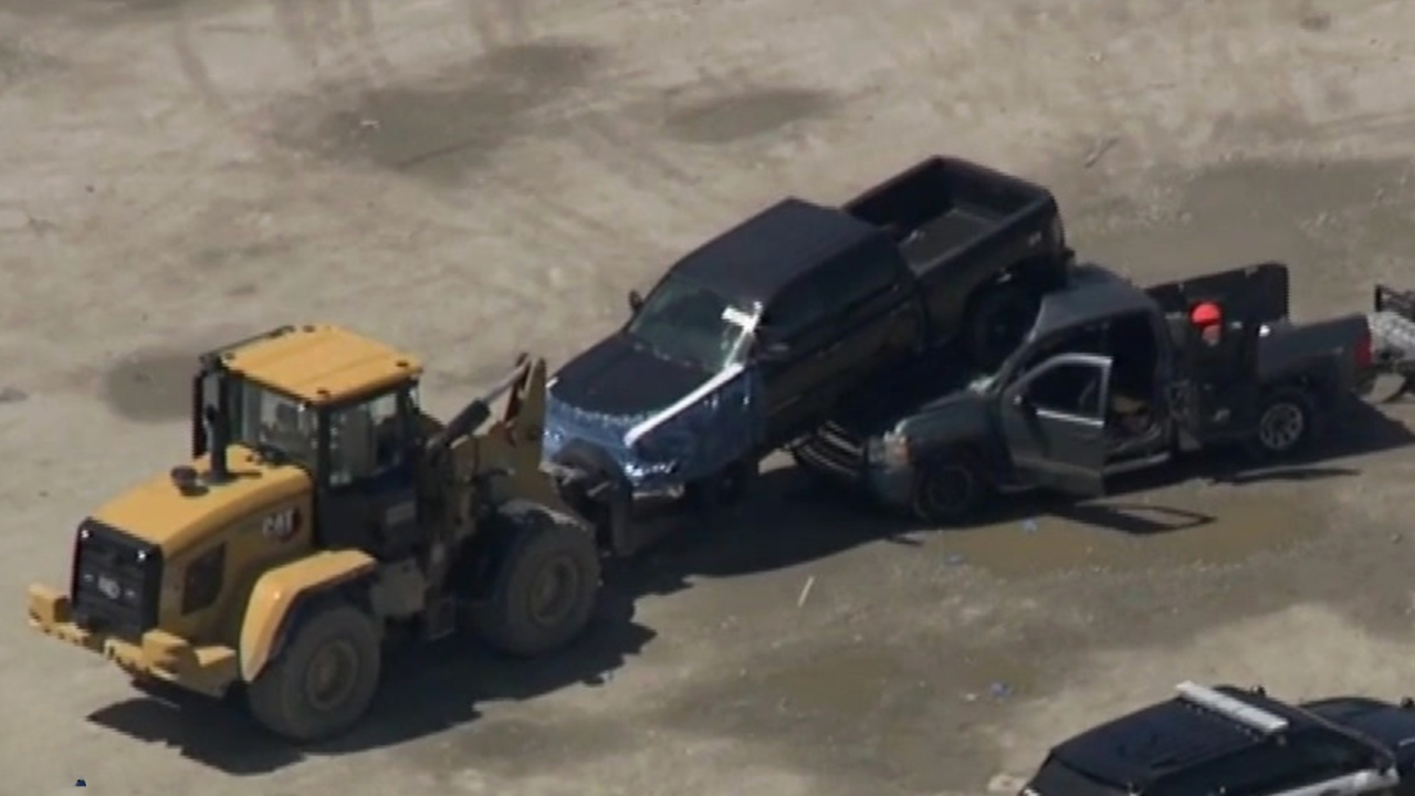 A Truck Was Dropped Onto Another Truck During An Auto Auction, But Was ...